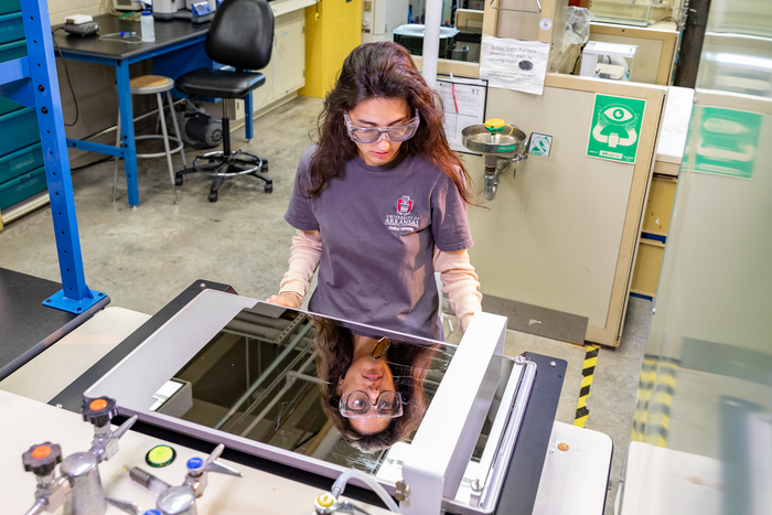 student and membrane fab.jpg [IMAGE] | EurekAlert! Science News Releases