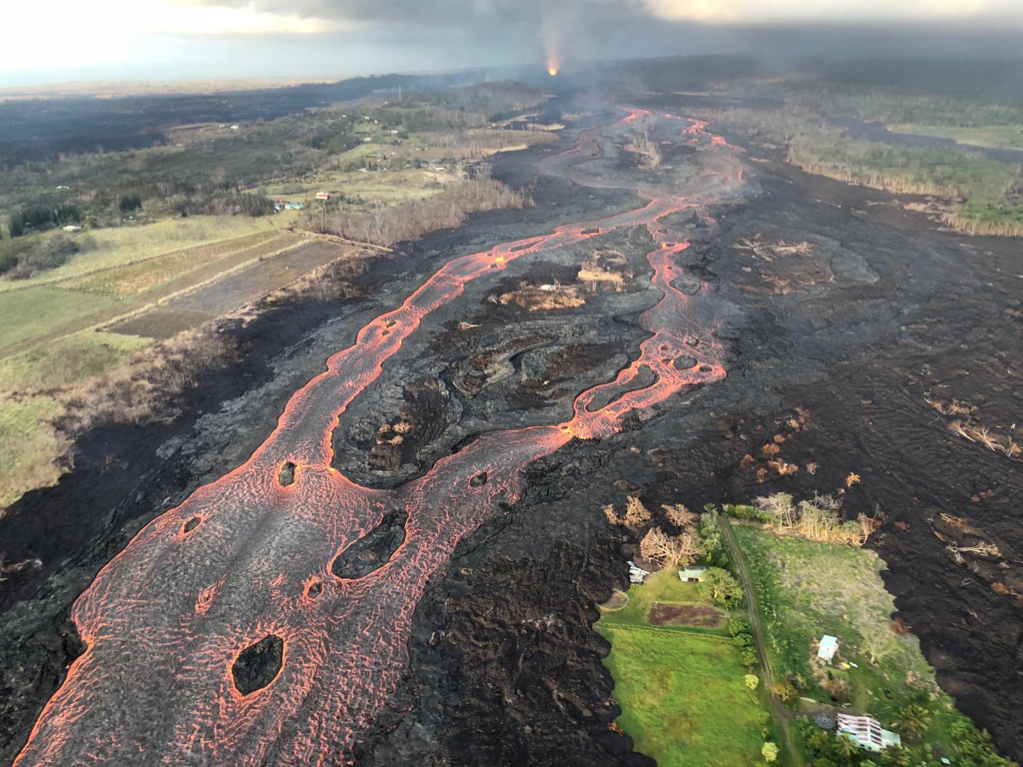 Houses surrounded by lava [IMAGE] | EurekAlert! Science News Releases