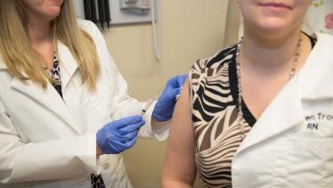 Clinician Receives Flu Vaccine [IMAGE] | EurekAlert! Science News Releases