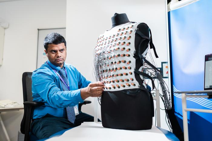 Dr George Joy with ECGI vest [IMAGE] | EurekAlert! Science News Releases