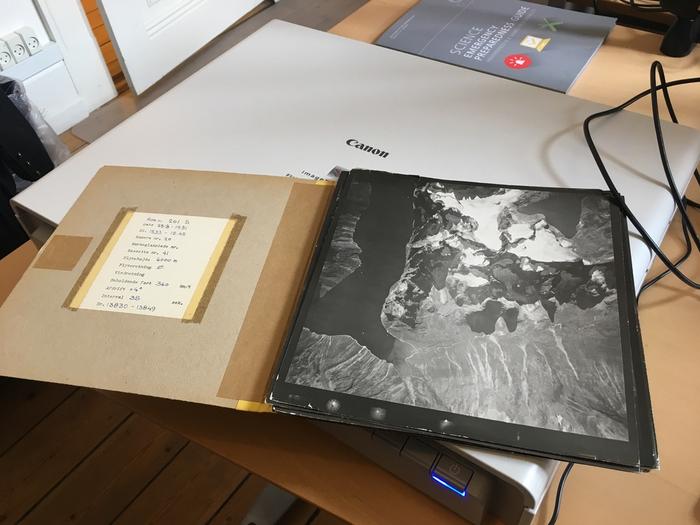 Scanning photos in the archive [IMAGE] | EurekAlert! Science News Releases