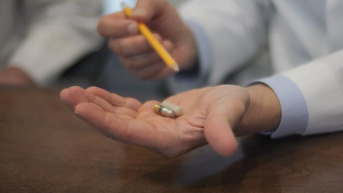 Ali Rezai, MD, holds the Celer [IMAGE] | EurekAlert! Science News Releases