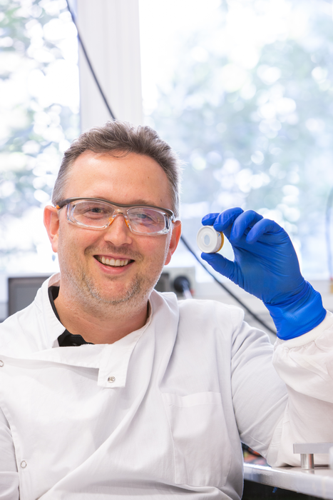 Dr Muller holding patch [IMAGE] | EurekAlert! Science News Releases