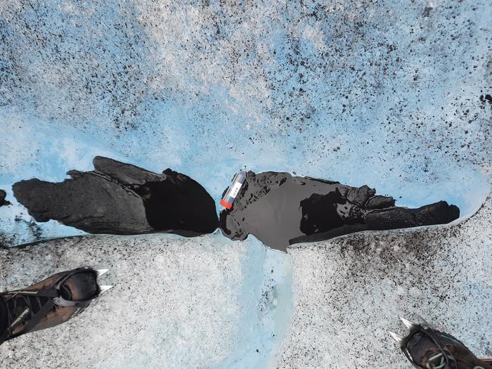 A typical cryoconite hole. [IMAGE] | EurekAlert! Science News Releases