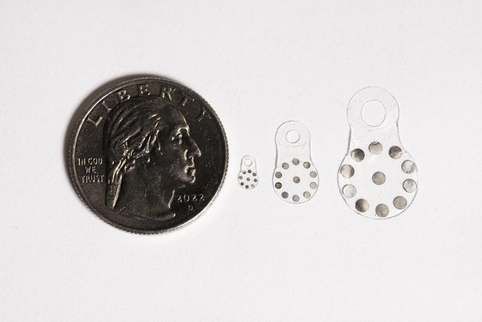 Stickers next to quarter [IMAGE] | EurekAlert! Science News Releases