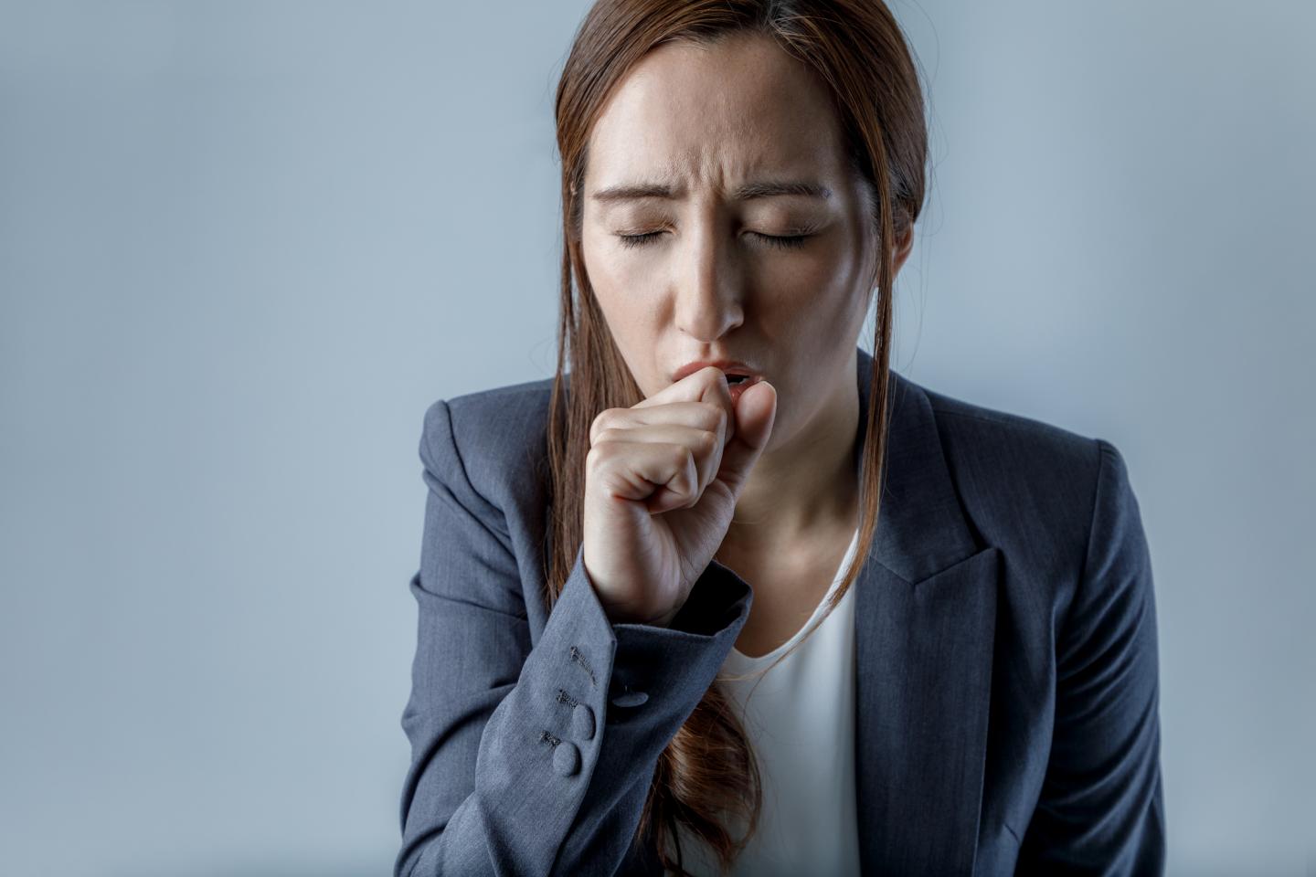 Woman Coughing