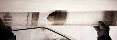 Ice Core Sample Contains Rock [IMAGE] | EurekAlert! Science News Releases